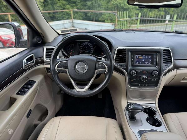 Red Jeep Grand Cherokee 2014 in Vilnius, with an engine capacity of 3.60 L and mileage of 155 thousand km for 13700 €, photo 3 on AUTOMOTO.COM.LV