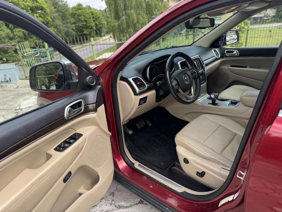 Red Jeep Grand Cherokee 2014 in Vilnius, with an engine capacity of 3.60 L and mileage of 155 thousand km for 13700 €, photo 8 on AUTOMOTO.COM.LV
