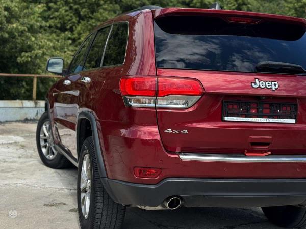 Red Jeep Grand Cherokee 2014 in Vilnius, with an engine capacity of 3.60 L and mileage of 155 thousand km for 13700 €, photo 10 on AUTOMOTO.COM.LV