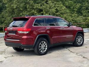 Red Jeep Grand Cherokee 2014 in Vilnius, with an engine capacity of 3.60 L and mileage of 155 thousand km for 13700 €, photo 14 on AUTOMOTO.COM.LV