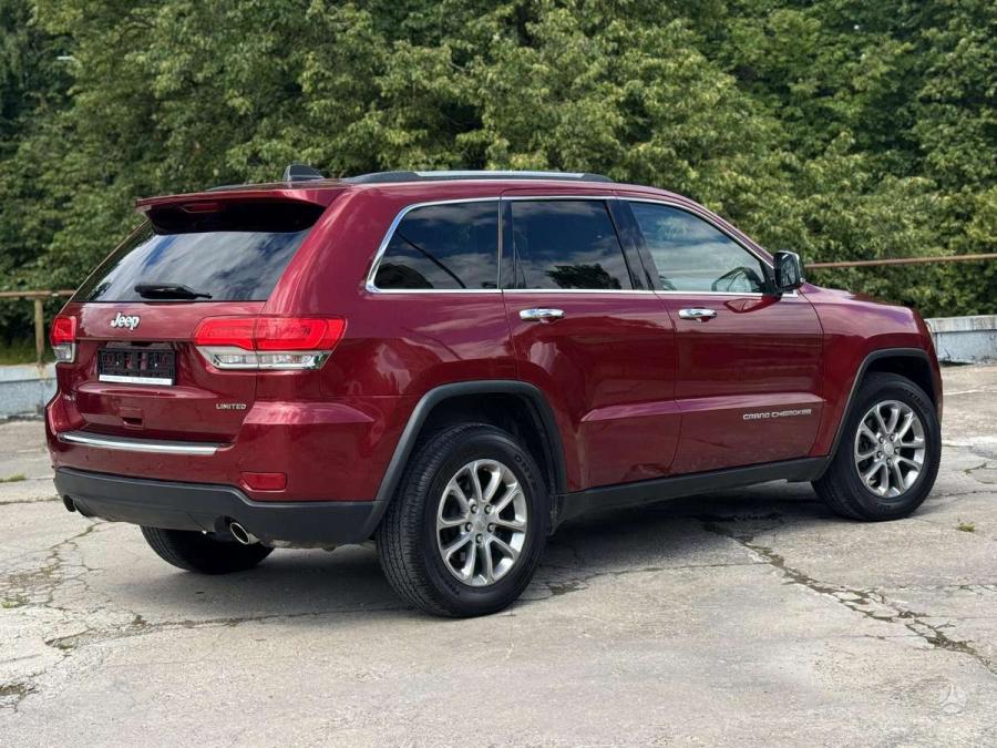 Red Jeep Grand Cherokee 2014 in Vilnius, with an engine capacity of 3.60 L and mileage of 155 thousand km for 13700 €, photo 14 on AUTOMOTO.COM.LV