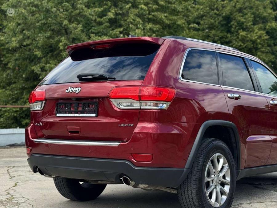 Red Jeep Grand Cherokee 2014 in Vilnius, with an engine capacity of 3.60 L and mileage of 155 thousand km for 13700 €, photo 15 on AUTOMOTO.COM.LV