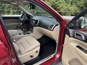 Red Jeep Grand Cherokee 2014 in Vilnius, with an engine capacity of 3.60 L and mileage of 155 thousand km for 13700 €, photo 16 on AUTOMOTO.COM.LV