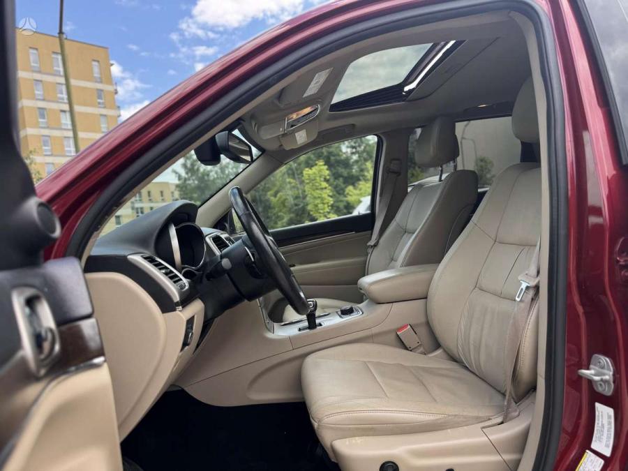 Red Jeep Grand Cherokee 2014 in Vilnius, with an engine capacity of 3.60 L and mileage of 155 thousand km for 13700 €, photo 22 on AUTOMOTO.COM.LV