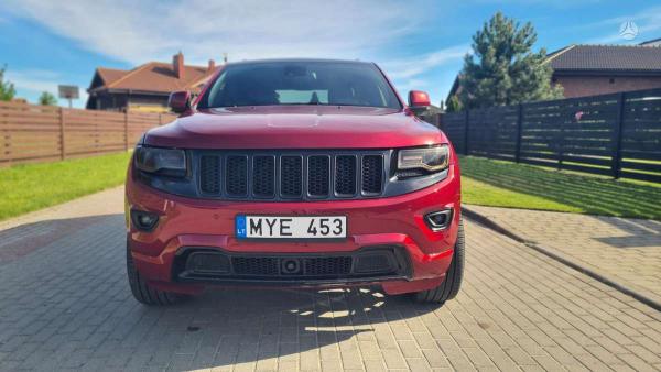 Red Jeep Grand Cherokee 2014 in Klaipeda, with an engine capacity of 2.99 L and mileage of 170 thousand km for 14000 €, photo 1 on AUTOMOTO.COM.LV