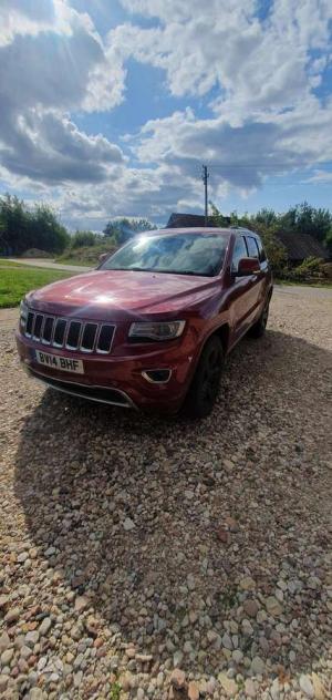 Red Jeep Grand Cherokee 2014 in Vilnius, with an engine capacity of 2.99 L and mileage of 203 thousand km for 6100 €, photo  on AUTOMOTO.COM.LV