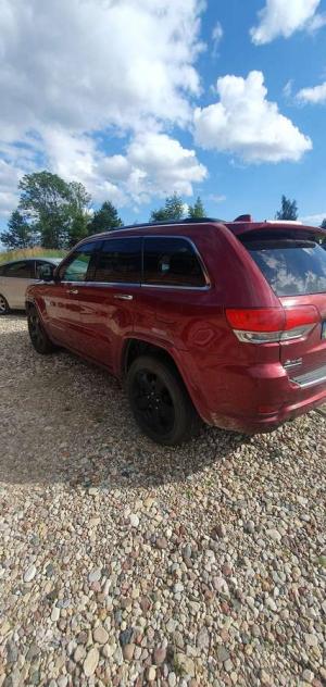 Red Jeep Grand Cherokee 2014 in Vilnius, with an engine capacity of 2.99 L and mileage of 203 thousand km for 6100 €, photo 4 on AUTOMOTO.COM.LV