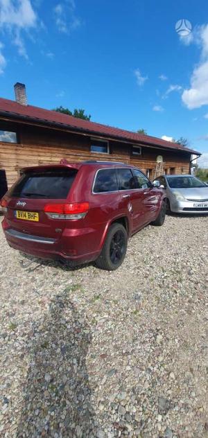 Red Jeep Grand Cherokee 2014 in Vilnius, with an engine capacity of 2.99 L and mileage of 203 thousand km for 6100 €, photo 5 on AUTOMOTO.COM.LV