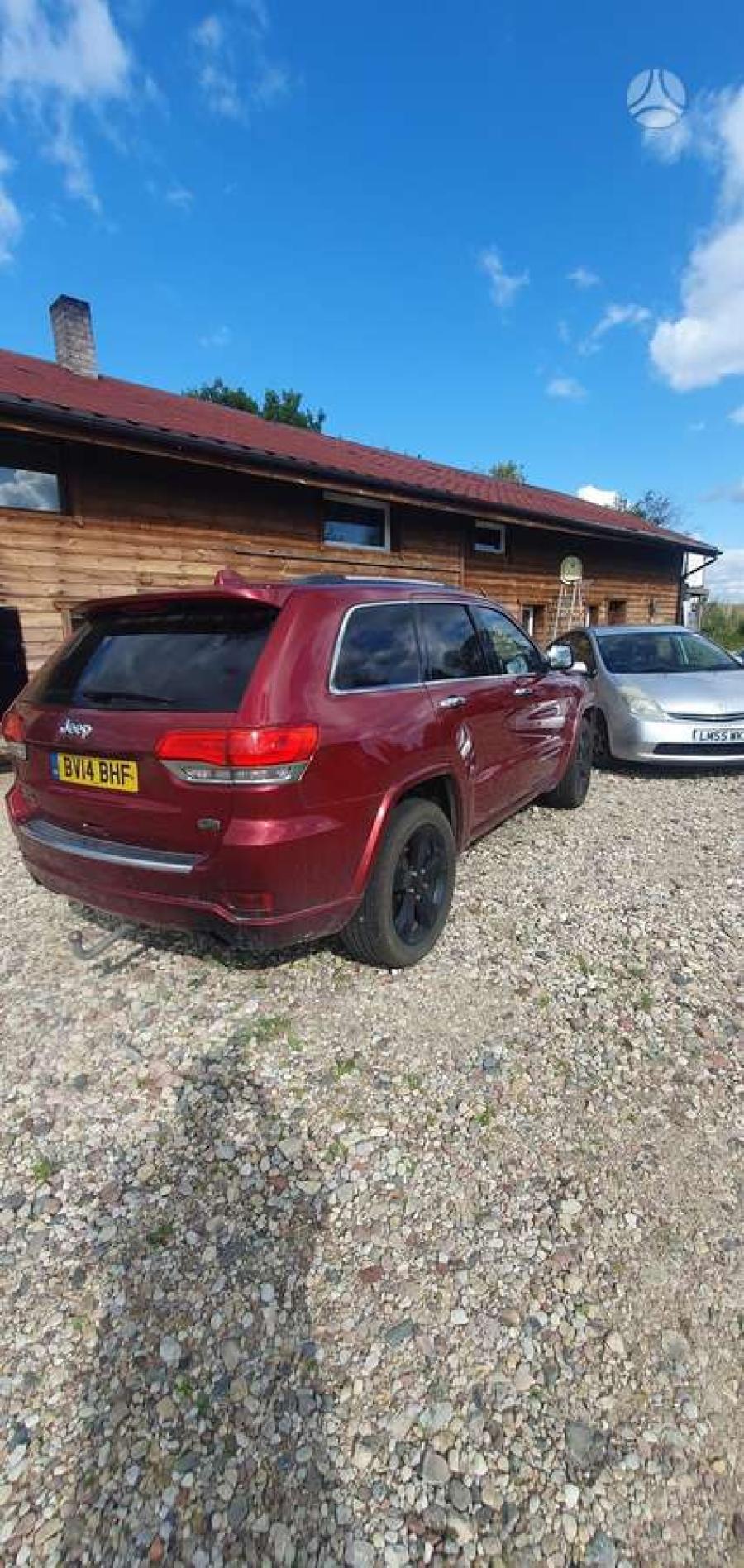 Red Jeep Grand Cherokee 2014 in Vilnius, with an engine capacity of 2.99 L and mileage of 203 thousand km for 6100 €, photo 5 on AUTOMOTO.COM.LV