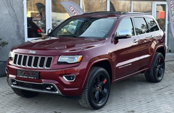 Red Jeep Grand Cherokee 2015 in Radviliskis, with an engine capacity of 3.60 L and mileage of 274 thousand km for 13850 €, photo 3 on AUTOMOTO.COM.LV