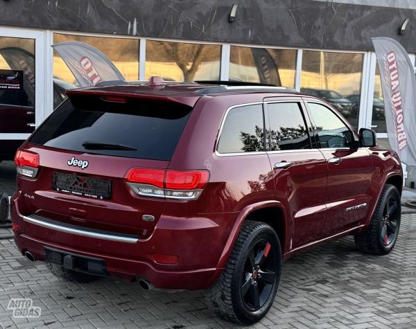 Red Jeep Grand Cherokee 2015 in Radviliskis, with an engine capacity of 3.60 L and mileage of 274 thousand km for 13850 €, photo 10 on AUTOMOTO.COM.LV