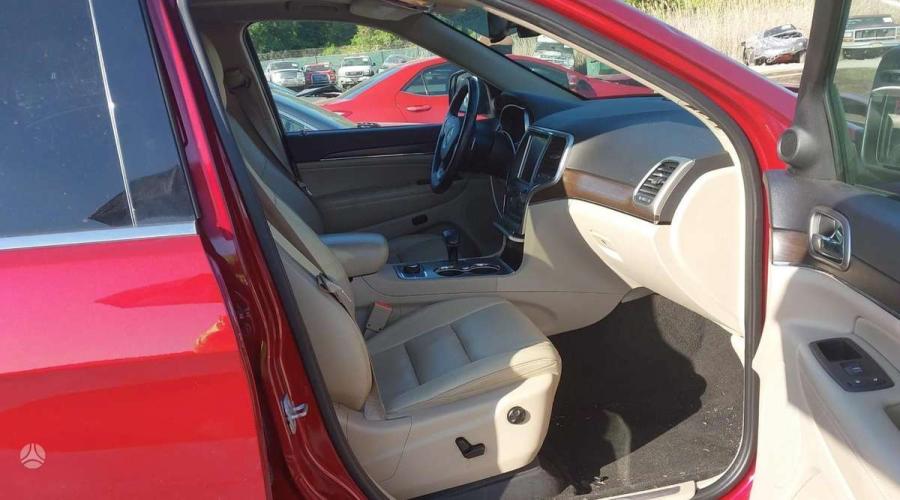 Sarkans Jeep Grand Cherokee 2015 Klaipėda, ar dzinēja tilpumu 3.60 L un nobraukumu 161 tūkst. km par 7000 €, foto 7 vietnē AUTOMOTO.COM.LV