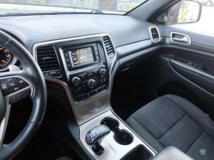 Red Jeep Grand Cherokee 2015 in Siauliai, with an engine capacity of 3.60 L and mileage of 368 thousand km for 5600 €, photo 11 on AUTOMOTO.COM.LV