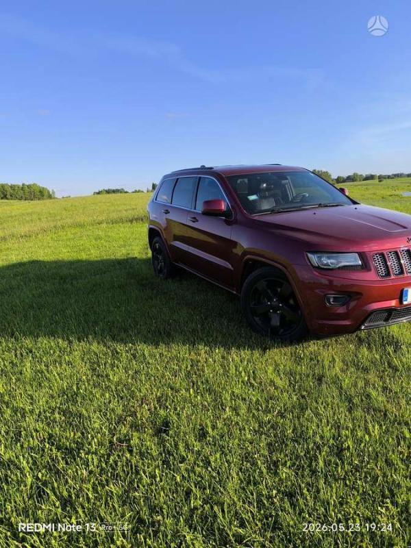 Sarkans Jeep Grand Cherokee 2015 Viļņa, ar dzinēja tilpumu 3.60 L un nobraukumu 192 tūkst. km par 14050 €, foto 3 vietnē AUTOMOTO.COM.LV