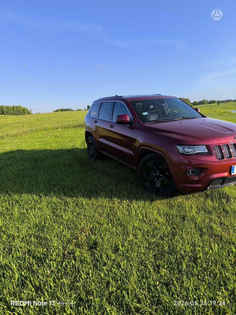 Red Jeep Grand Cherokee 2015 in Vilnius, with an engine capacity of 3.60 L and mileage of 192 thousand km for 14050 €, photo 4 on AUTOMOTO.COM.LV