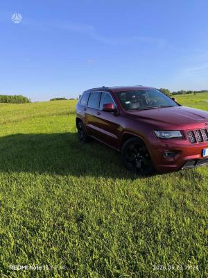 Red Jeep Grand Cherokee 2015 in Vilnius, with an engine capacity of 3.60 L and mileage of 192 thousand km for 14050 €, photo 5 on AUTOMOTO.COM.LV