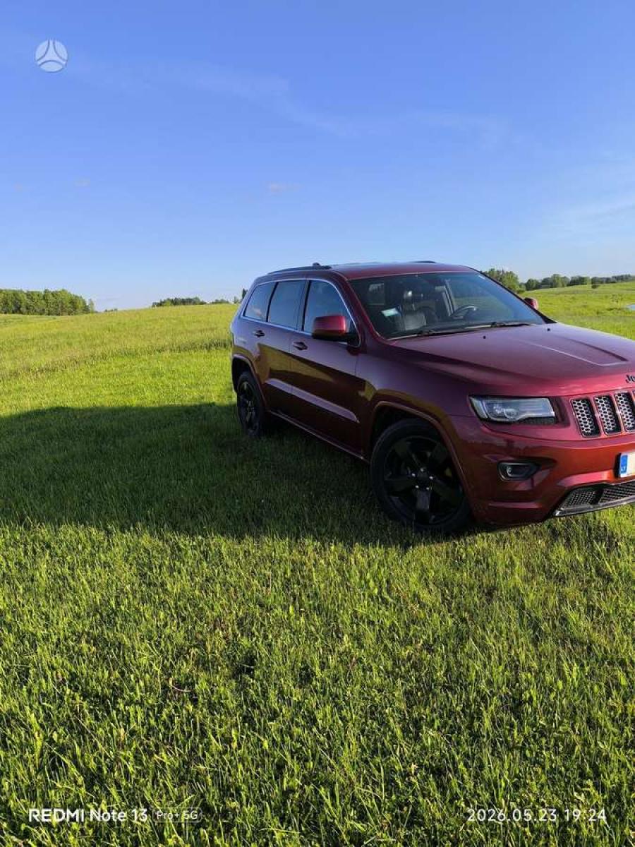 Red Jeep Grand Cherokee 2015 in Vilnius, with an engine capacity of 3.60 L and mileage of 192 thousand km for 14050 €, photo 5 on AUTOMOTO.COM.LV