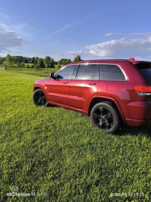 Red Jeep Grand Cherokee 2015 in Vilnius, with an engine capacity of 3.60 L and mileage of 192 thousand km for 14050 €, photo 7 on AUTOMOTO.COM.LV