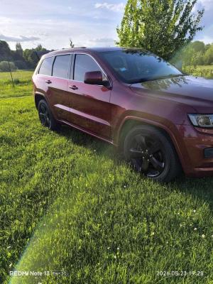 Red Jeep Grand Cherokee 2015 in Vilnius, with an engine capacity of 3.60 L and mileage of 192 thousand km for 14050 €, photo 14 on AUTOMOTO.COM.LV