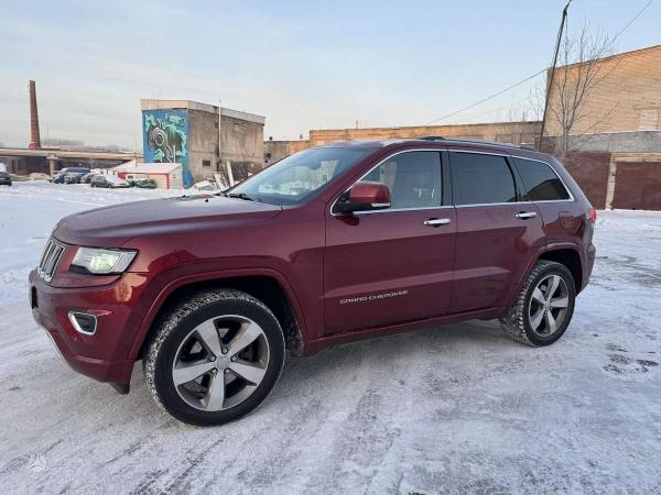 Red Jeep Grand Cherokee 2016 in Klaipeda, with an engine capacity of 2.99 L and mileage of 197 thousand km for 14700 €, photo 1 on AUTOMOTO.COM.LV