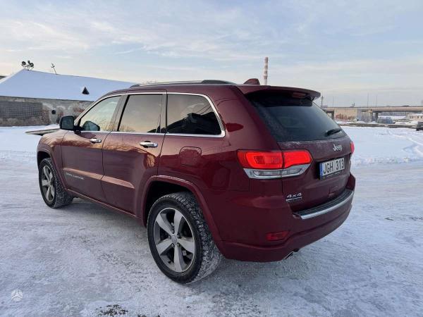 Red Jeep Grand Cherokee 2016 in Klaipeda, with an engine capacity of 2.99 L and mileage of 197 thousand km for 14700 €, photo 6 on AUTOMOTO.COM.LV
