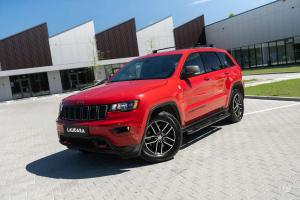 Red Jeep Grand Cherokee 2017 in Vilnius, with an engine capacity of 5.65 L and mileage of 130 thousand km for 21500 €, photo  on AUTOMOTO.COM.LV
