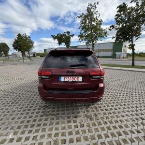 Red Jeep Grand Cherokee 2017 in Siauliai, with an engine capacity of 3.60 L and mileage of 264 thousand km for 13800 €, photo 6 on AUTOMOTO.COM.LV