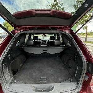 Red Jeep Grand Cherokee 2017 in Siauliai, with an engine capacity of 3.60 L and mileage of 264 thousand km for 13800 €, photo 12 on AUTOMOTO.COM.LV