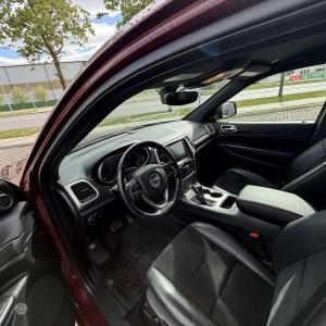Red Jeep Grand Cherokee 2017 in Siauliai, with an engine capacity of 3.60 L and mileage of 264 thousand km for 13800 €, photo 14 on AUTOMOTO.COM.LV