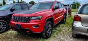 Red Jeep Grand Cherokee 2017 in Kretinga, with an engine capacity of 5.65 L and mileage of 154 thousand km for 19900 €, photo  on AUTOMOTO.COM.LV