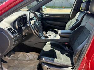 Red Jeep Grand Cherokee 2017 in Kretinga, with an engine capacity of 5.65 L and mileage of 154 thousand km for 19900 €, photo 7 on AUTOMOTO.COM.LV