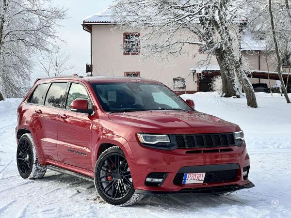 Red Jeep Grand Cherokee 2018 in Vilnius, with an engine capacity of 6.40 L and mileage of 93 thousand km for 42000 €, photo 11 on AUTOMOTO.COM.LV