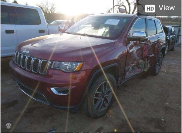 Red Jeep Grand Cherokee 2021 in Kaunas, with an engine capacity of 3.60 L and mileage of 147 thousand km for 10800 €, photo 2 on AUTOMOTO.COM.LV