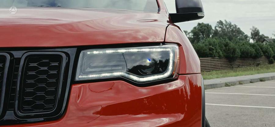 Red Jeep Grand Cherokee 2021 in Klaipeda, with an engine capacity of 3.60 L and mileage of 124 thousand km for 21000 €, photo 6 on AUTOMOTO.COM.LV