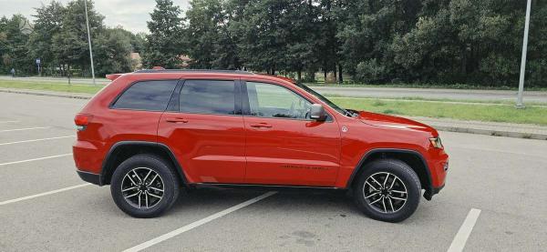 Red Jeep Grand Cherokee 2021 in Klaipeda, with an engine capacity of 3.60 L and mileage of 124 thousand km for 21000 €, photo 10 on AUTOMOTO.COM.LV