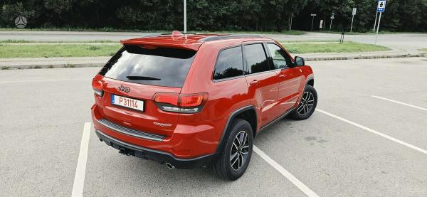 Red Jeep Grand Cherokee 2021 in Klaipeda, with an engine capacity of 3.60 L and mileage of 124 thousand km for 21000 €, photo 11 on AUTOMOTO.COM.LV