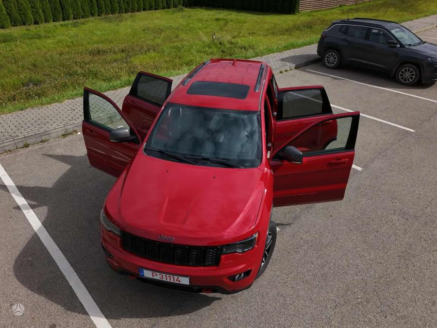 Red Jeep Grand Cherokee 2021 in Klaipeda, with an engine capacity of 3.60 L and mileage of 124 thousand km for 21000 €, photo 16 on AUTOMOTO.COM.LV