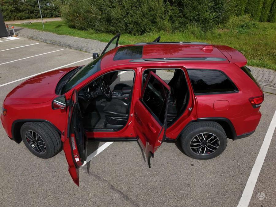 Red Jeep Grand Cherokee 2021 in Klaipeda, with an engine capacity of 3.60 L and mileage of 124 thousand km for 21000 €, photo 18 on AUTOMOTO.COM.LV