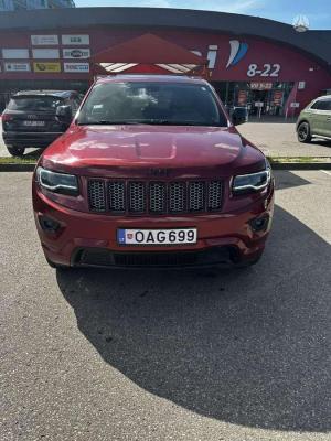 Red Jeep Grand Cherokee 2015 in Vilnius, with an engine capacity of 3.60 L and mileage of 193 thousand km for 14300 €, photo  on AUTOMOTO.COM.LV