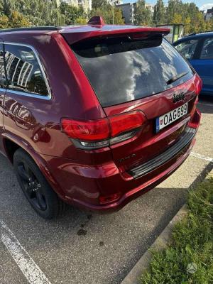 Red Jeep Grand Cherokee 2015 in Vilnius, with an engine capacity of 3.60 L and mileage of 193 thousand km for 14300 €, photo 6 on AUTOMOTO.COM.LV