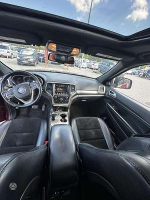 Red Jeep Grand Cherokee 2015 in Vilnius, with an engine capacity of 3.60 L and mileage of 193 thousand km for 14300 €, photo 8 on AUTOMOTO.COM.LV