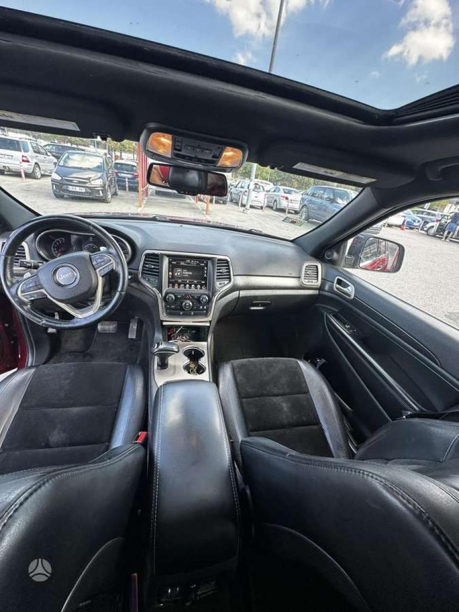 Red Jeep Grand Cherokee 2015 in Vilnius, with an engine capacity of 3.60 L and mileage of 193 thousand km for 14300 €, photo 8 on AUTOMOTO.COM.LV
