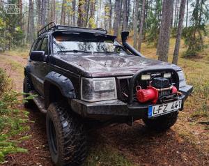Violet Jeep Grand Cherokee 1996 in Vilnius, with an engine capacity of 5.20 L and mileage of 340 thousand km for 4600 €, photo 3 on AUTOMOTO.COM.LV