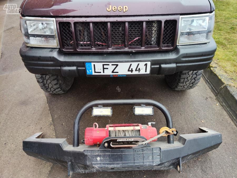 Violet Jeep Grand Cherokee 1996 in Vilnius, with an engine capacity of 5.20 L and mileage of 340 thousand km for 4600 €, photo 8 on AUTOMOTO.COM.LV