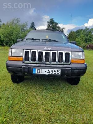 Violets Jeep Grand Cherokee 1996 Tukums, ar dzinēja tilpumu 2.50 L un nobraukumu 270 tūkst. km par 7200 €, foto  vietnē AUTOMOTO.COM.LV