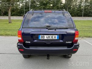 Violets Jeep Grand Cherokee 2000 Rīga, ar dzinēja tilpumu 3.10 L un nobraukumu 0 tūkst. km par 9900 €, foto 3 vietnē AUTOMOTO.COM.LV