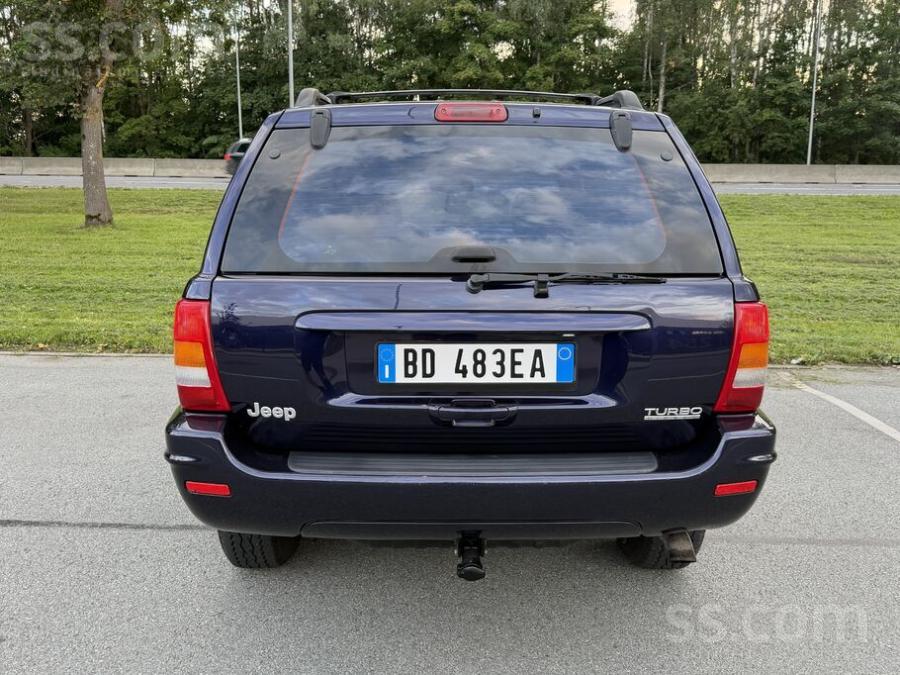 Violets Jeep Grand Cherokee 2000 Rīga, ar dzinēja tilpumu 3.10 L un nobraukumu 0 tūkst. km par 9900 €, foto 3 vietnē AUTOMOTO.COM.LV