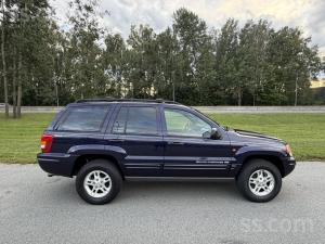 Violets Jeep Grand Cherokee 2000 Rīga, ar dzinēja tilpumu 3.10 L un nobraukumu 0 tūkst. km par 9900 €, foto 5 vietnē AUTOMOTO.COM.LV