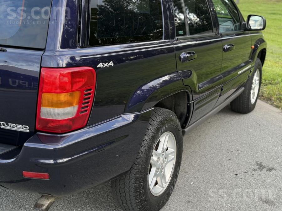 Violets Jeep Grand Cherokee 2000 Rīga, ar dzinēja tilpumu 3.10 L un nobraukumu 0 tūkst. km par 9900 €, foto 7 vietnē AUTOMOTO.COM.LV