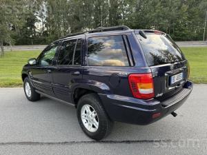 Violets Jeep Grand Cherokee 2000 Rīga, ar dzinēja tilpumu 3.10 L un nobraukumu 0 tūkst. km par 9900 €, foto 8 vietnē AUTOMOTO.COM.LV